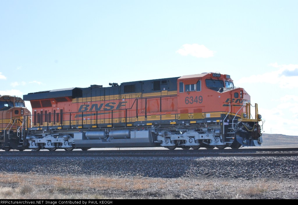 BNSF 6349 brand new ES44AC rolls east as rear DPU unit just 12 days out of GE locomotive plant ...